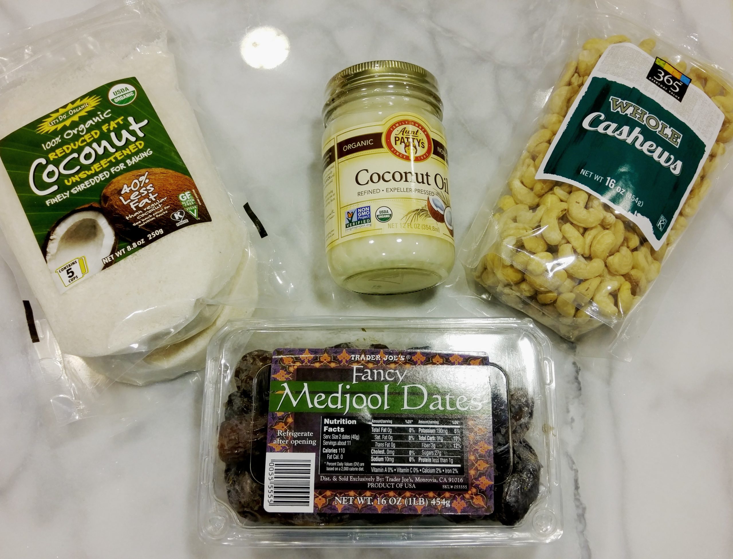 4 Ingredient Coconut Covered Date Balls Recipe | The Dimple Life